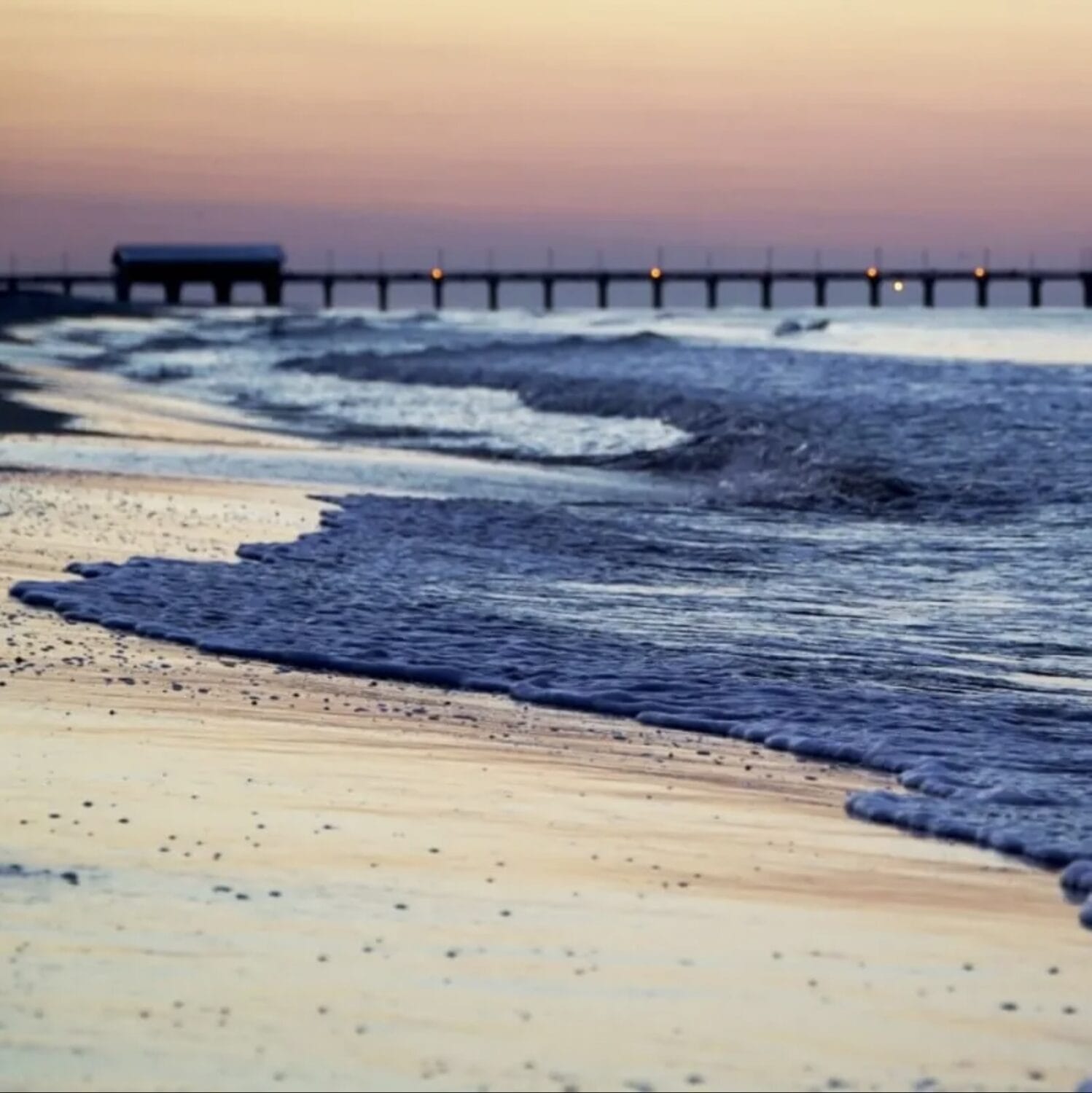 beach at gulf shores alabama during sunset