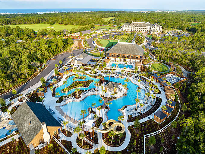 Experience the ultimate aerial view of our sprawling oasis at Camp Creek Inn, where luxury meets Florida's stunning natural beauty.