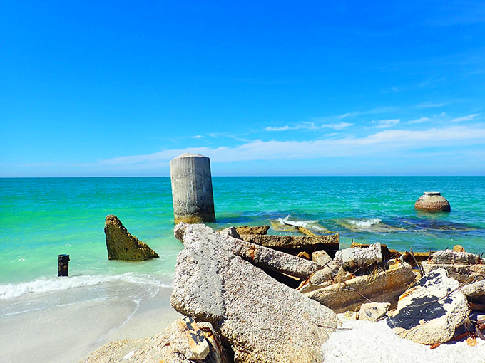 Nature's masterpiece: Turquoise waters meet weathered concrete at Egmont Key, where history and waves collide in spectacular fashion.