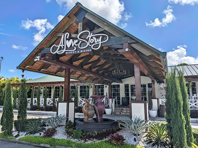 Welcome to paradise! A Love Story's grand entrance combines rustic wooden beams with elegant landscaping, promising wine-soaked adventures ahead.