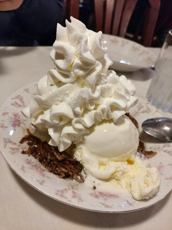 Dessert here is a towering affair &ndash; vanilla ice cream crowned with a cloud of whipped cream that defies gravity just like the circus performers of old.
