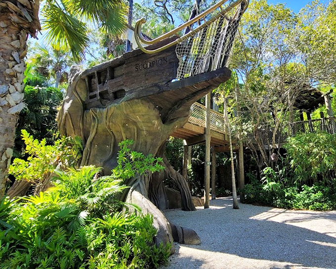 The Scorpion pirate ship emerges from jungle foliage &ndash; a wooden vessel of imagination for young explorers.