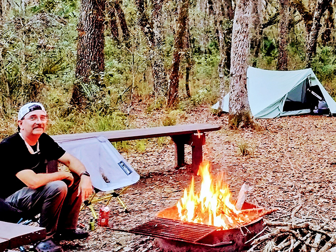 A peaceful campsite scene with crackling flames – proof that s'mores taste better when earned after a day of hiking.