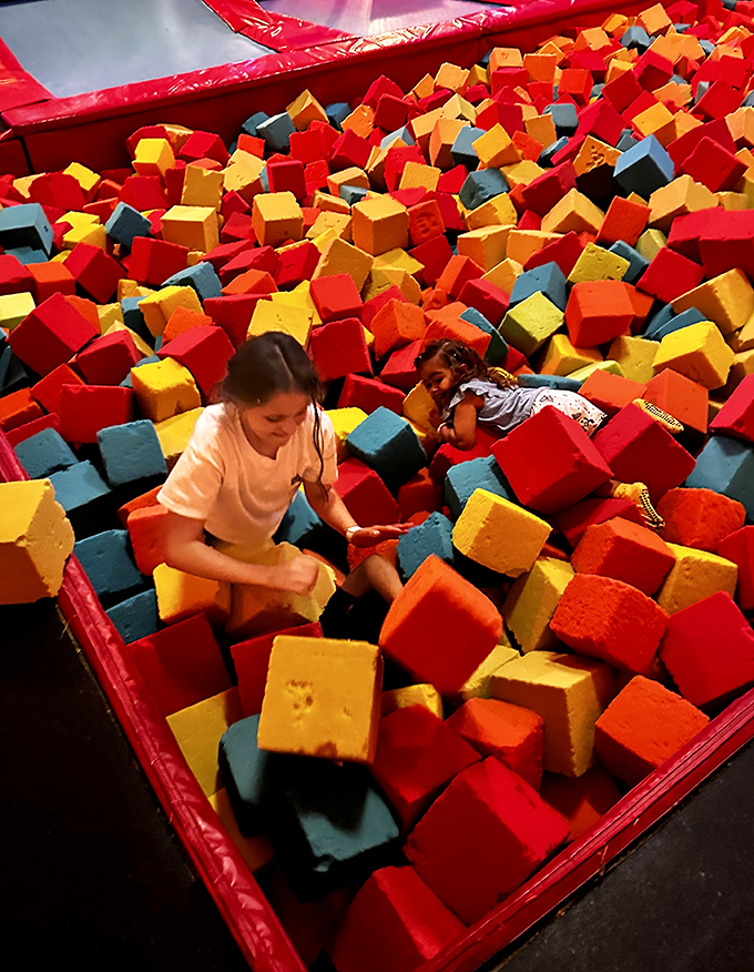 The foam pit: where dignity goes to die and pure joy is born – a colorful cube ocean that turns adults into giggling five-year-olds.