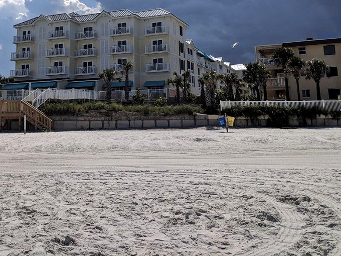 Beachfront accommodations rise from the sand like elegant sentinels, offering lucky guests front-row seats to nature's greatest show.