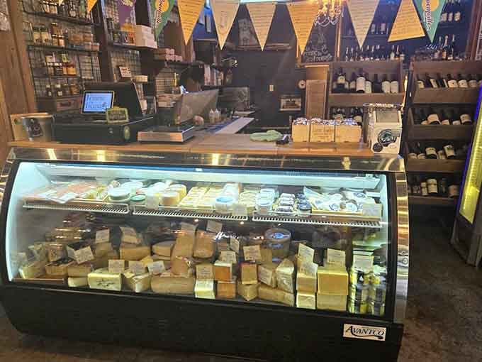 The cheese counter displays its dairy treasures like edible jewels, each variety offering its own unique flavor profile and texture experience.