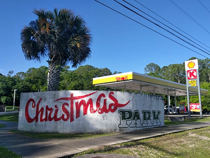 The "Christmas Park" sign welcomes visitors to a town where holiday spirit and Florida sunshine create an unexpected harmony.