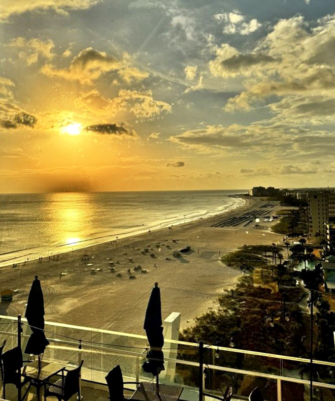 Nature's nightly show from Spinners &ndash; a sunset painting the Gulf in impossible oranges and golds, upstaging even the most beautiful dessert.