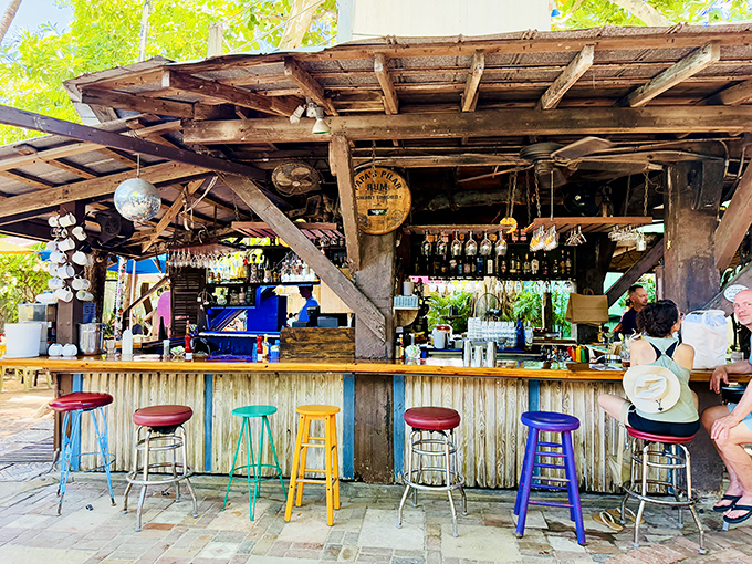 The outdoor seating area is filled with vibrant chairs that add a splash of color to the surroundings.