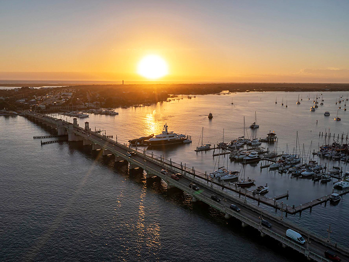 Golden hour magic transforms A1A into a pathway of light, where day's end brings spectacular waterfront drama.