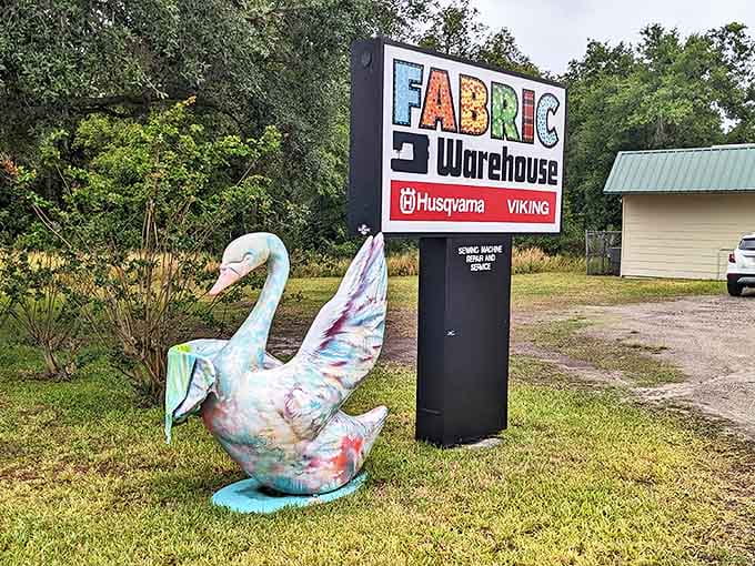 The sign that launched a thousand projects, with a fabric swan guardian that seems to say, "Come in, creativity awaits!"