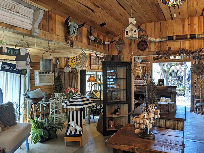 Warm wood paneling and rustic d&eacute;cor transform this shop into a country home fantasy, complete with wagon wheel accents and vintage lighting fixtures.