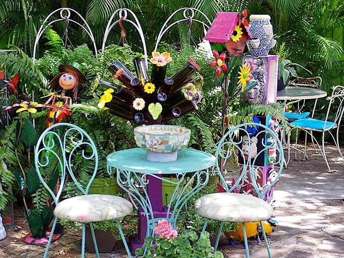 Garden seating gets the full artistic treatment with vintage metal chairs, creating an outdoor gallery where nature and creativity mingle.