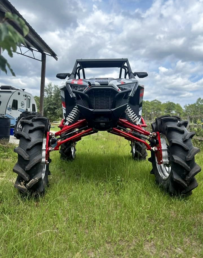 ATV: Modern adventure meets old Florida wilderness as these mechanical beasts tackle varied terrain with impressive ground clearance.