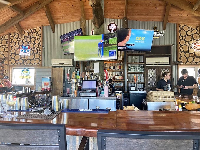 The rustic bar area combines natural wood elements with modern amenities, creating a space where craft cocktails and conversation flow with equal ease.
