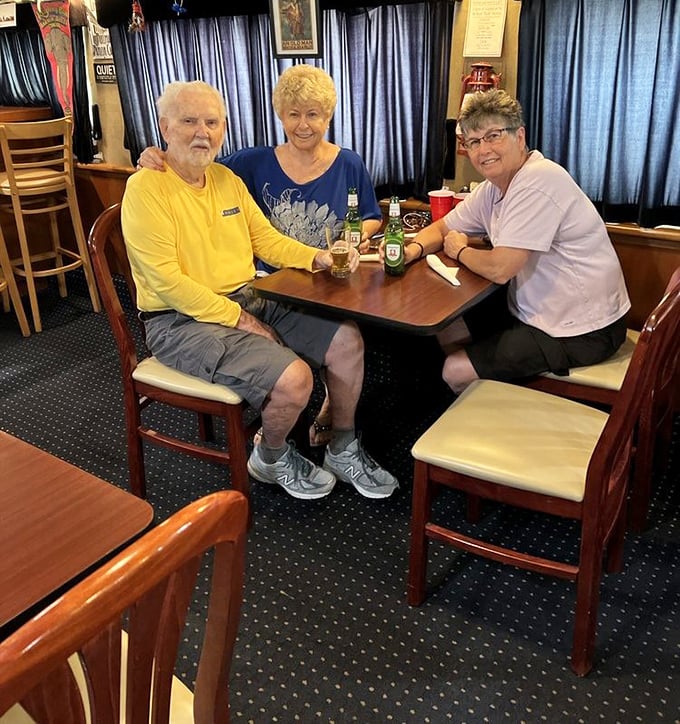 Happy patrons enjoy cold beverages and warm conversation in a setting unlike any other restaurant in Florida &ndash; where else can you dine in circus history?