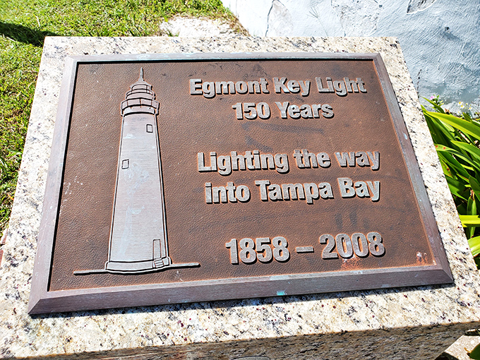 A bronze reminder of Egmont Key lighthouse's 150-year legacy, guiding countless vessels safely into Tampa Bay since 1858.