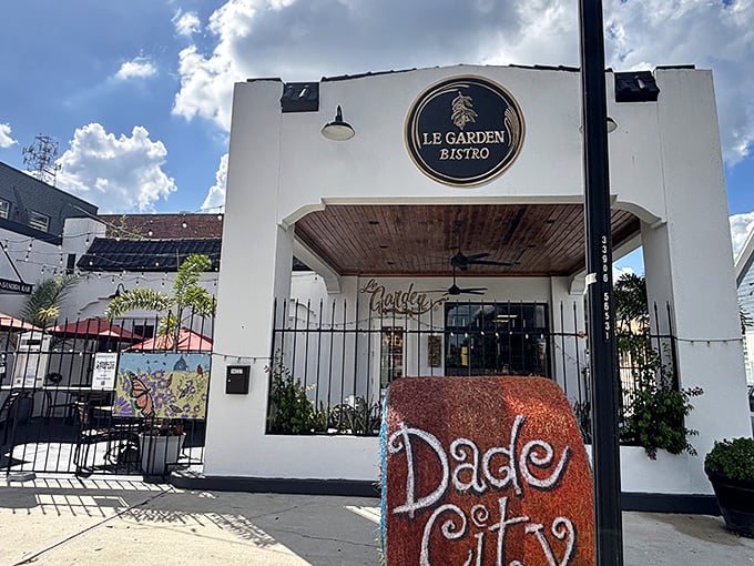 Le Garden Bistro welcomes diners with its distinctive entrance and Dade City rock, a perfect blend of elegance and local charm.