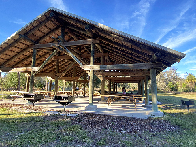 This rustic shelter provides the perfect spot for a family picnic, with rough-hewn beams and ample tables for gathering.