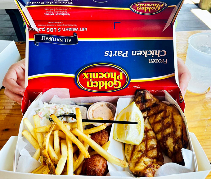 Grilled pompano served in a humble box that belies the extraordinary flavors within&mdash;seafood this fresh needs no fancy presentation.