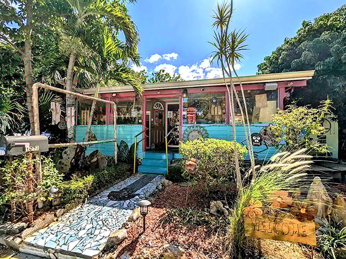 This whimsical turquoise cottage, filled with art and color, perfectly reflects the Village of the Arts’ creative spirit.