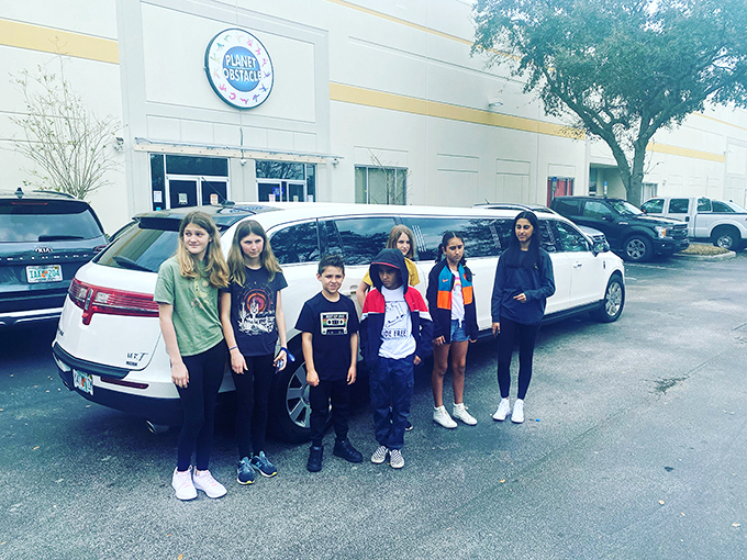 Arriving in style – because nothing says "best birthday ever" like pulling up to Planet Obstacle in a stretch limo.