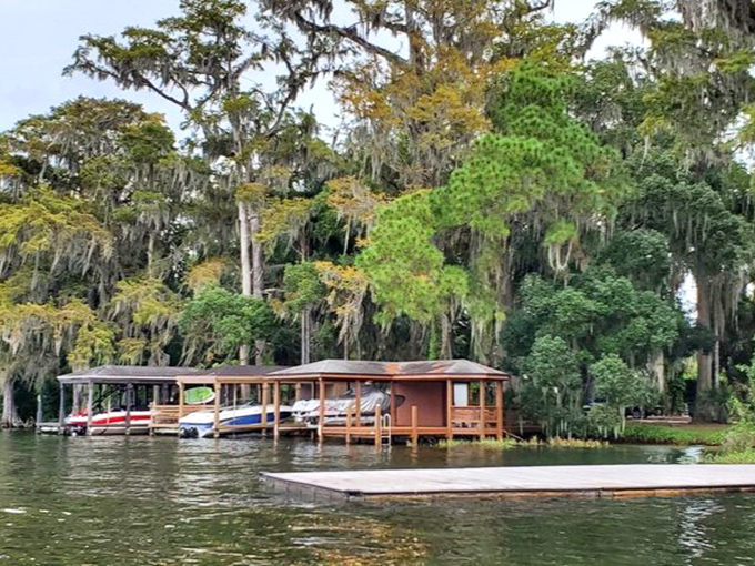 Boat houses that put most people's actual houses to shame line the waterfront, ready to shelter watercraft worth more than your car.
