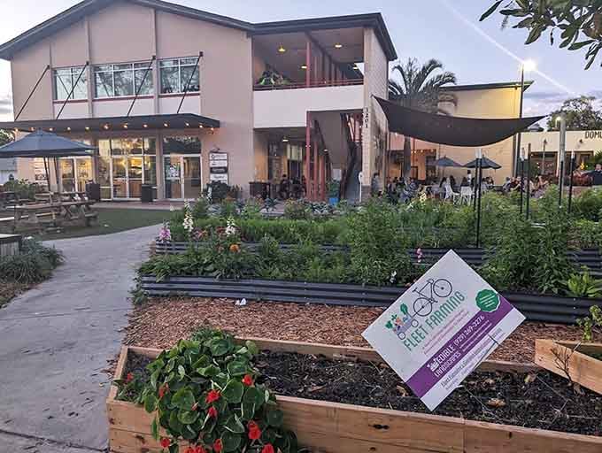 The outdoor space with its community garden beds shows that East End Market's commitment to local food extends right down to the soil.