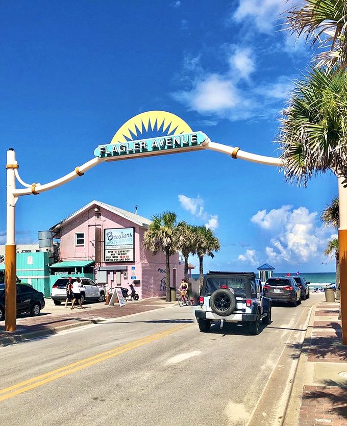 The iconic Flagler Avenue arch welcomes visitors to New Smyrna's beachside paradise, where coastal charm meets small-town hospitality.