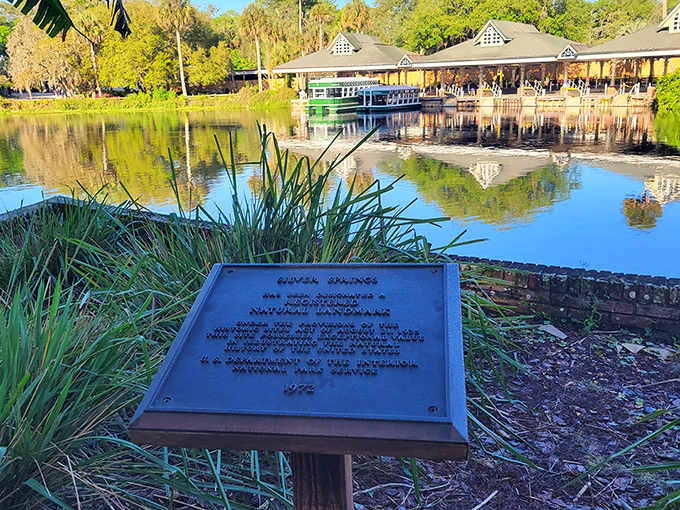 A plaque commemorates Silver Springs' designation as a National Natural Landmark, telling the story of this geological wonder.