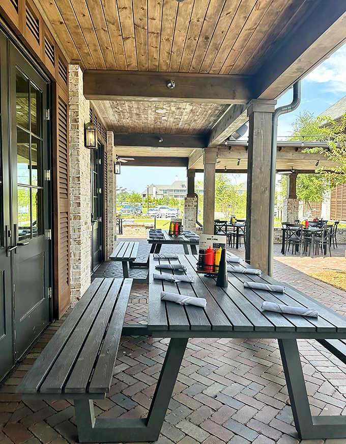 Enjoy casual alfresco dining on our shaded patio, featuring comfortable picnic tables perfect for sharing a meal with your family.