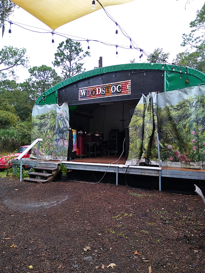 The "Woodstock" stage area, complete with vintage vibes, stands ready for impromptu performances or simply reminiscing about concerts you were too young to attend.