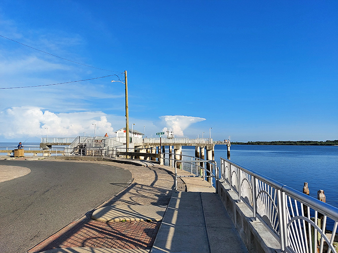 The fishing pier curves into the Gulf like a question mark, asking "Why would you ever leave?"