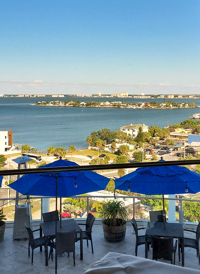 The daytime view reveals St. Pete Beach in all its glory &ndash; turquoise waters meeting white sand while boats dot the horizon like confetti.