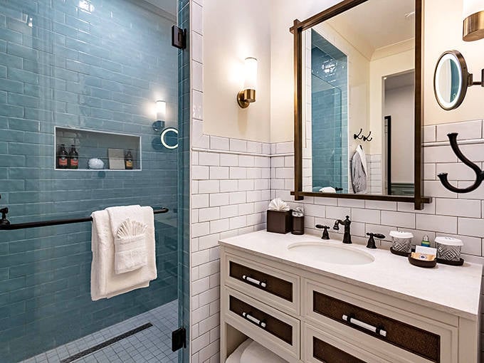 Refresh in style within our modern bathrooms, boasting beautiful blue tiling, sleek finishes, and all the comforts of home luxury.