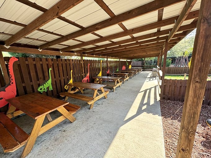 Picnic tables with dinosaur-shaped dividers – the perfect spot to contemplate how you'd fare in the Cretaceous period while eating your sandwich.