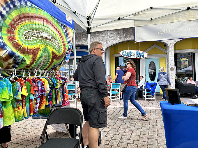 Vibrant tie-dye shirts add a splash of Florida hippie culture to the European-inspired marketplace.