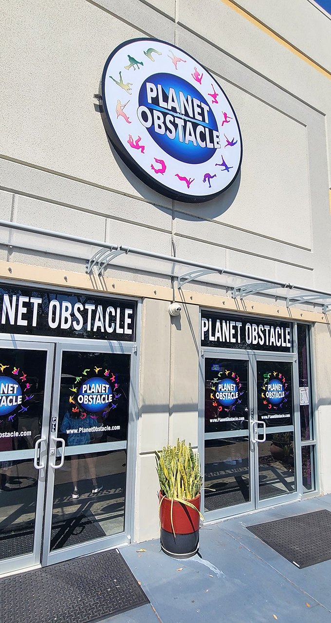 Planet Obstacle's entrance beckons adventure-seekers with its vibrant signage – like a portal to a dimension where adulting is temporarily suspended.