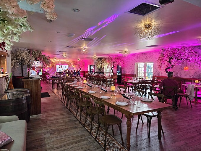 Step into a magical forest of cherry blossoms and ambient lighting where every table feels like the best seat in the house.