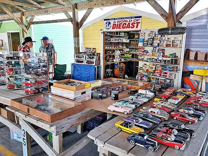 Miniature automotive history on display! This "World of Diecast" booth showcases meticulously detailed model cars that transport collectors back to their childhood dreams.