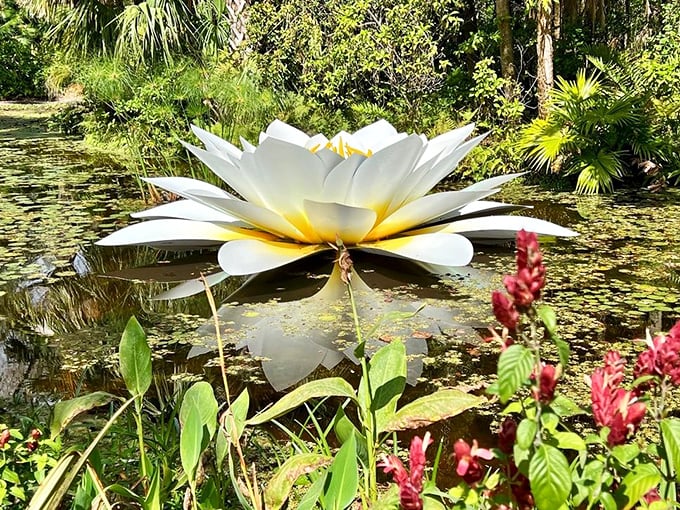 This giant water lily sculpture floats majestically, capturing the garden's perfect balance of natural wonder and artistic vision.