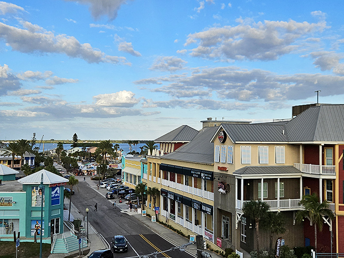 The waterfront attraction dazzles with its colorful buildings and bustling boardwalk, like a coastal painting come to life.