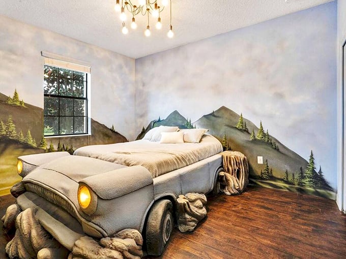 Sleep inside a vintage car surrounded by mountains, because apparently beds on the ground are so last century.