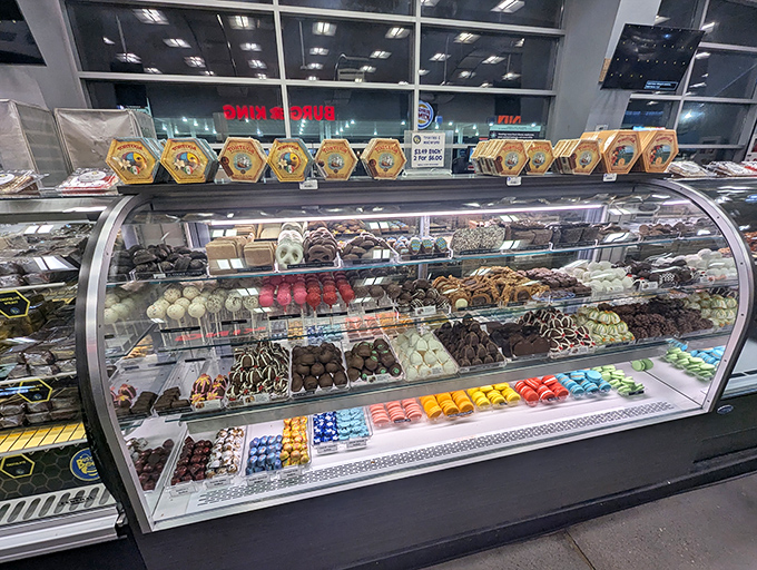 This isn't your average gas station snack selection &ndash; the display case offers handcrafted chocolates and treats that would make a pastry chef proud.