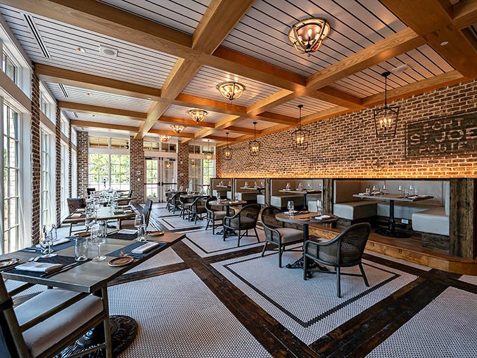 Savor exquisite flavors in our rustic-chic dining room, where warm brick walls and elegant lighting set the stage for memories.