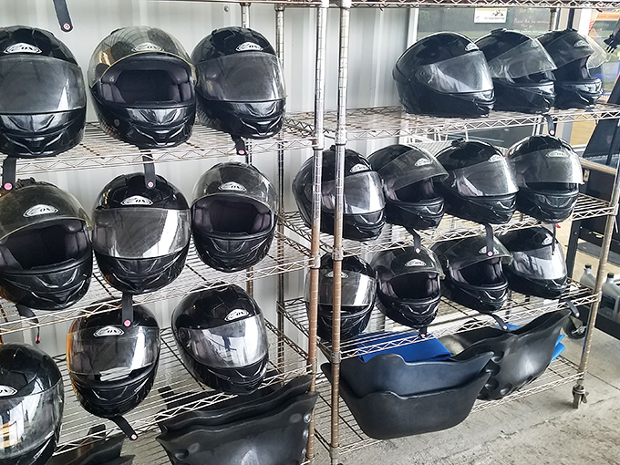 The wall of possibilities! Each helmet represents a different racing persona waiting to be unleashed.