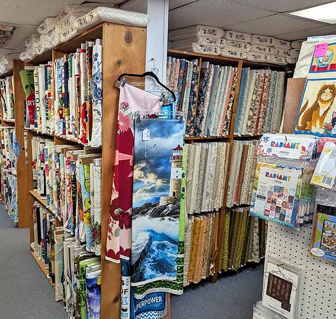 Fabric shelves stretch toward infinity, a textile version of that endless bookshelf scene from "Beauty and the Beast."