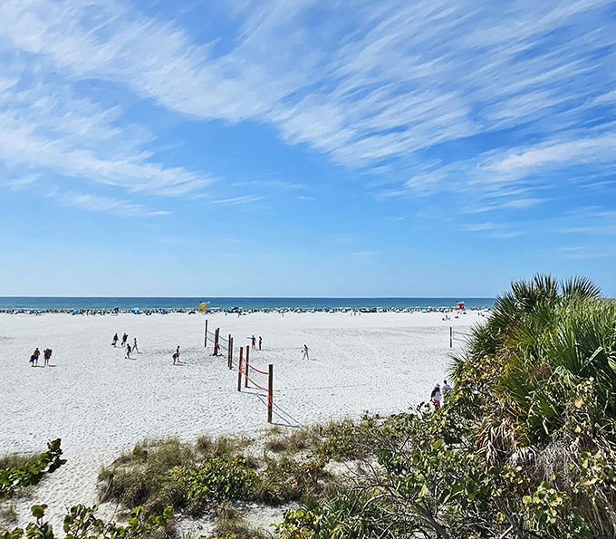 Siesta Key Beach: Where Amish vacationers trade bonnets for modest swimwear and dip toes in Gulf waters just miles from home.