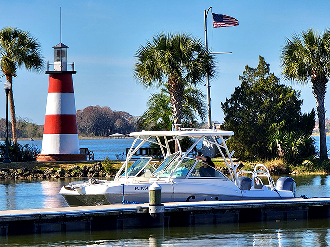 Boaters find safe harbor near the lighthouse, where the gentle waters of Lake Dora offer a perfect day on the water.