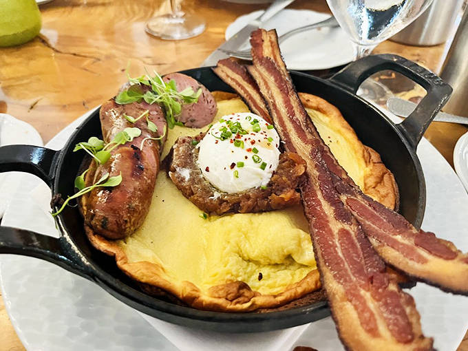 This isn't just breakfast, it's morning bliss &ndash; a perfectly puffed Dutch baby pancake with sausage, egg, and bacon that redefines rise-and-shine.